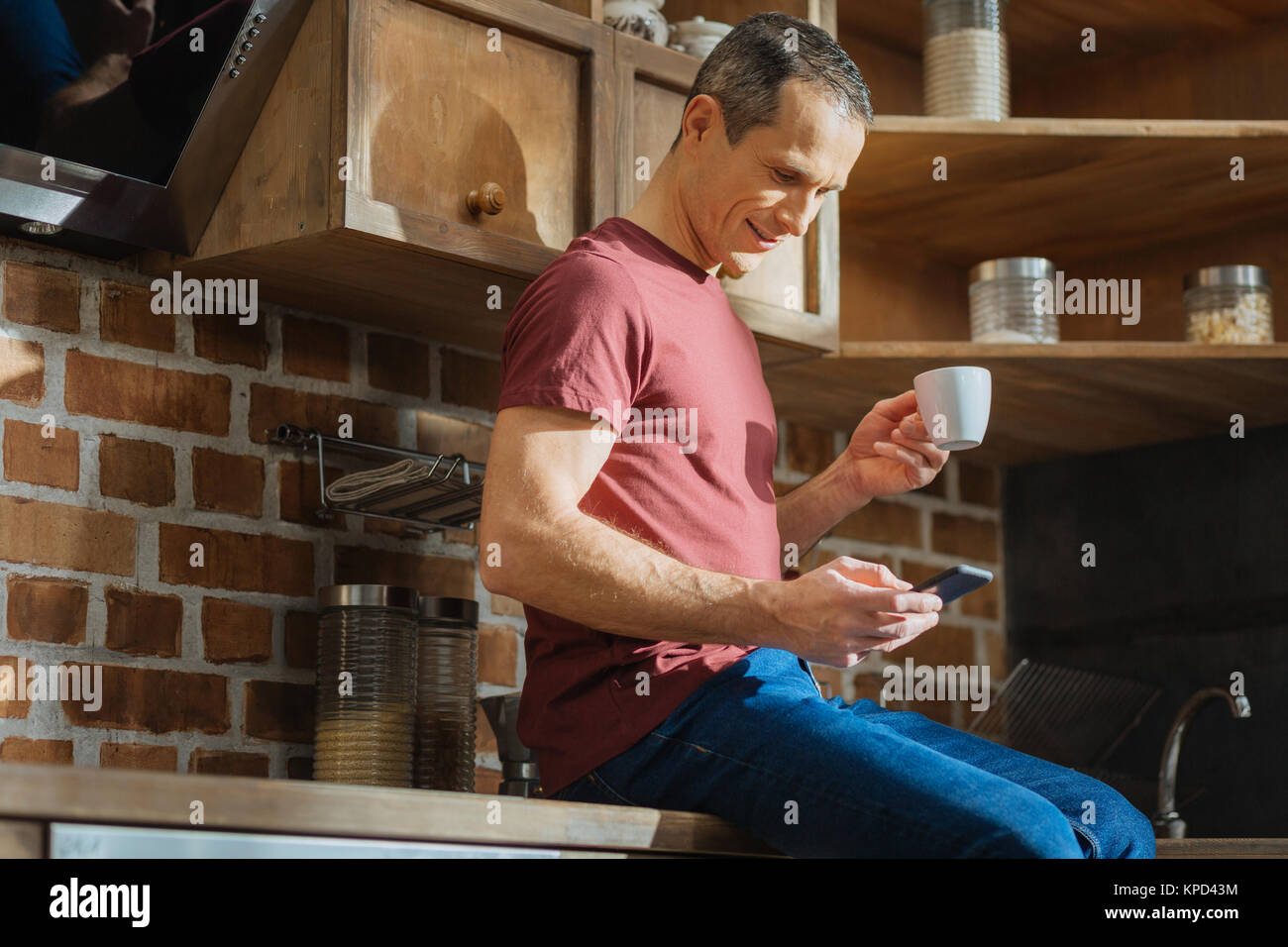 Handsome man checking his email Stock Photo - Alamy