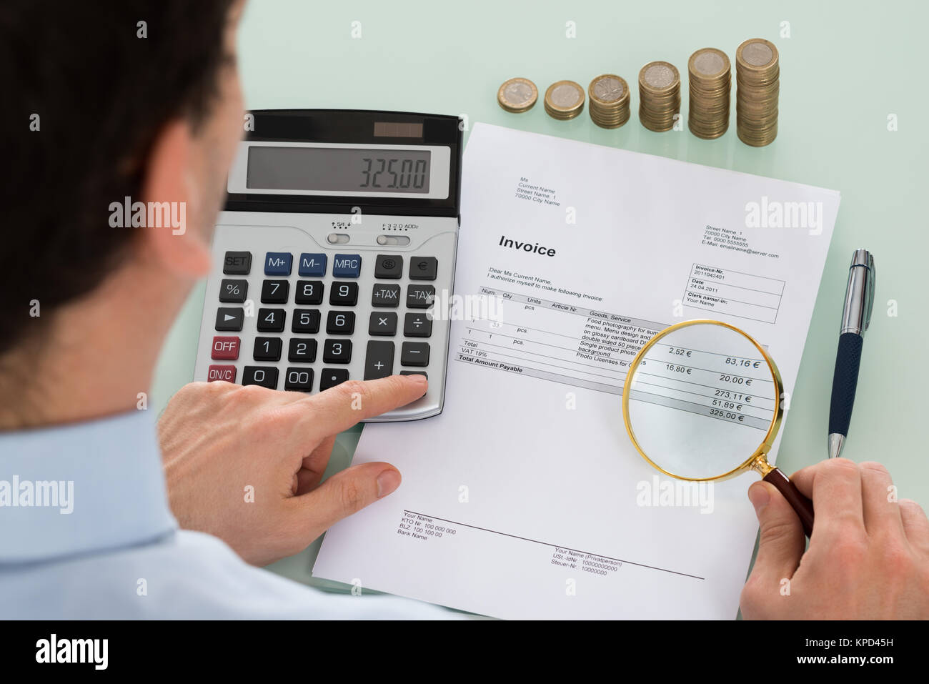 Businessperson Examining Invoice Stock Photo - Alamy Businessperson Examining Invoice Stock Photo - Alamy