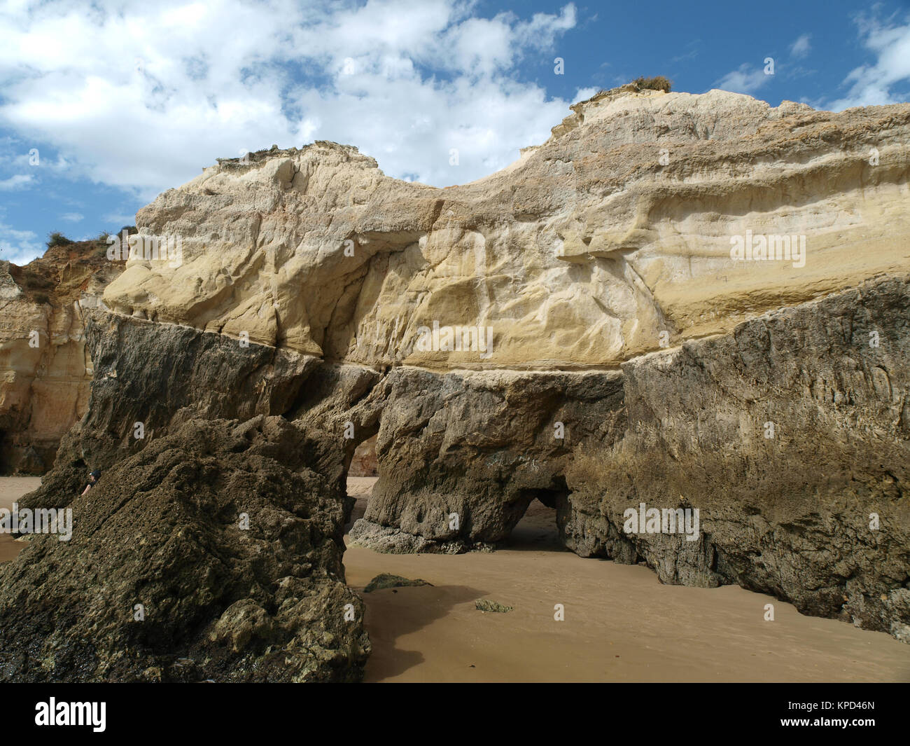 Caves and colourful rock formations on the Algarve coast in Portugal ...