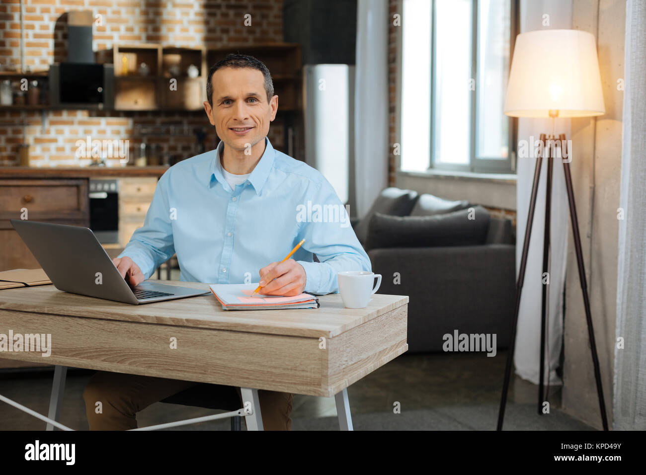 Handsome male looking straight at camera Stock Photo - Alamy
