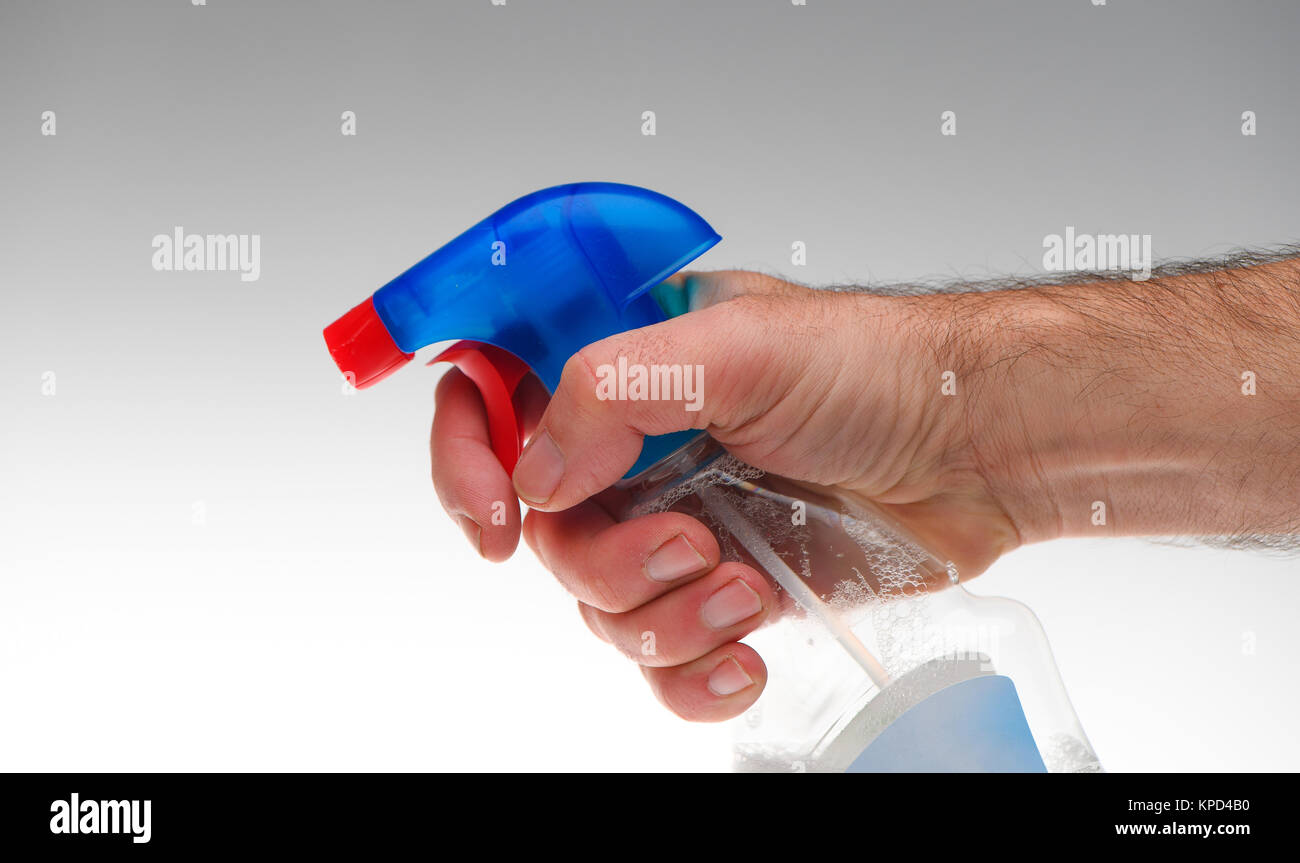 Close up of hand spraying Dettol anti-bacterial surface cleaner spray ...