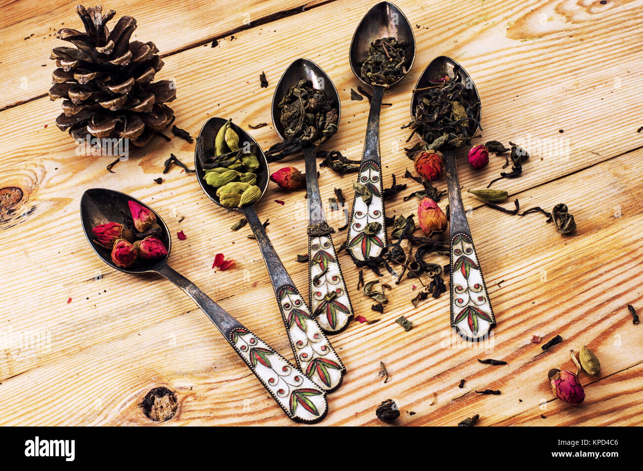 range of different varieties of tea leaves on wooden background Stock ...