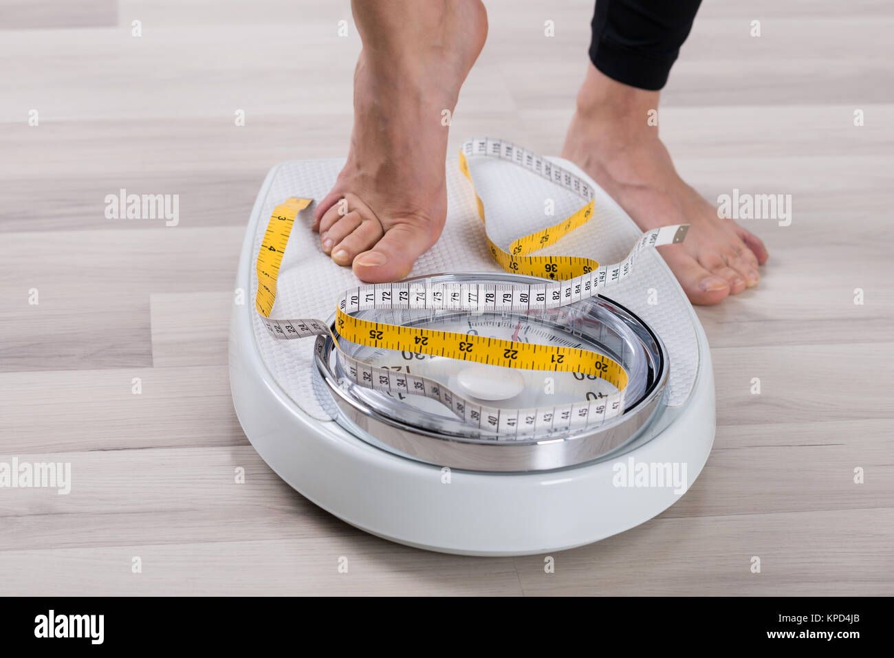 Person Feet Standing On Weighing Scale Stock Photo - Alamy