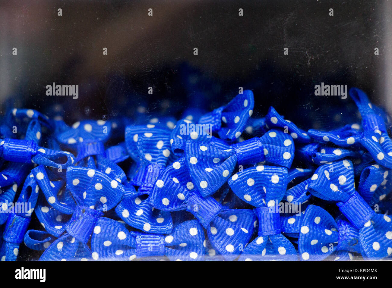 Collection of blue color bows with dots in view Stock Photo - Alamy