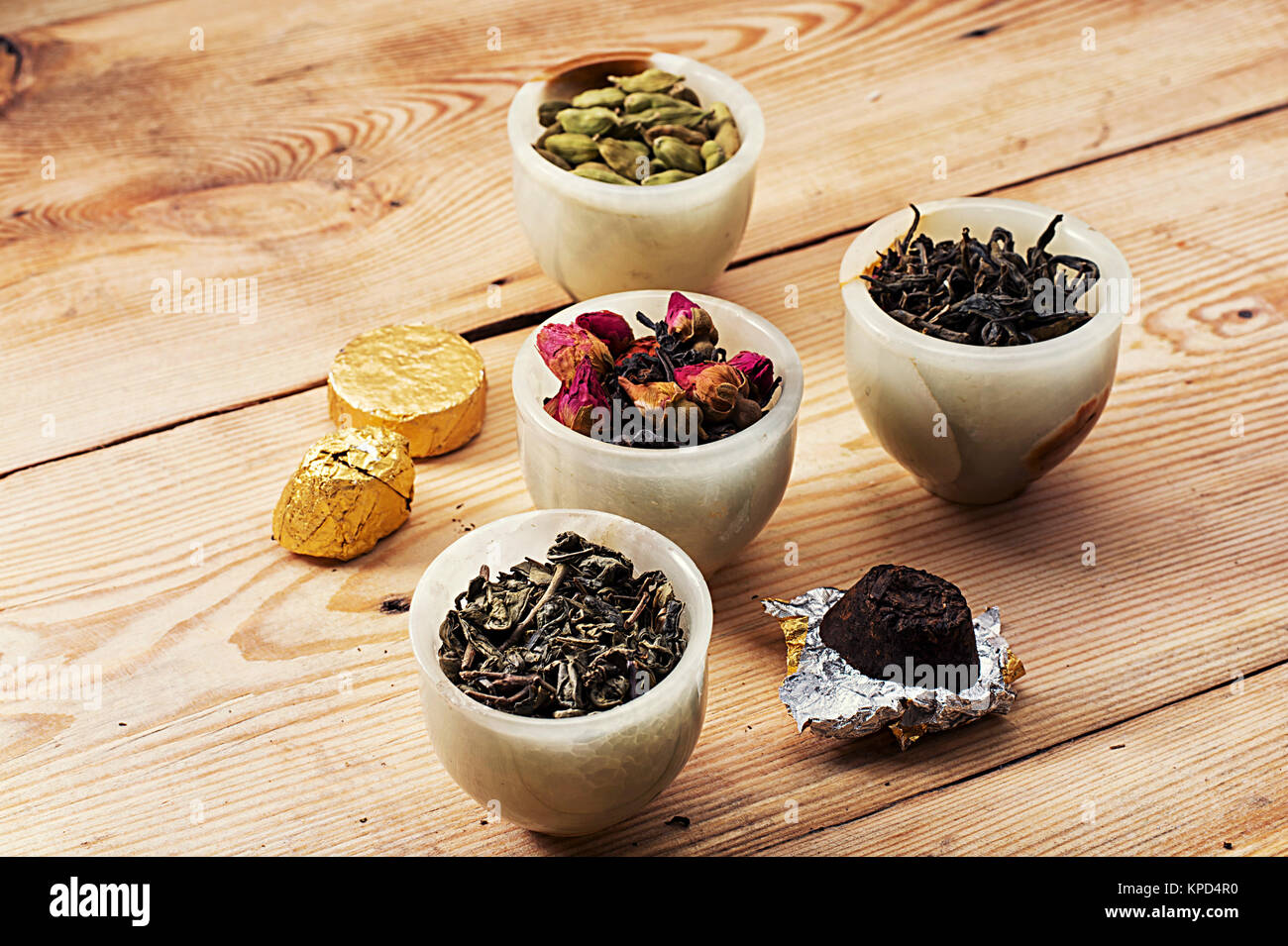 range of different varieties of tea leaves on wooden background Stock ...