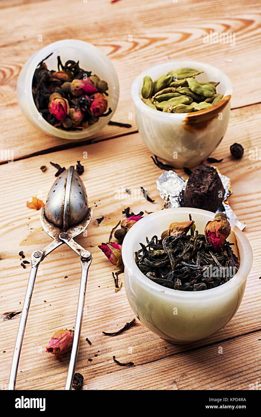 range of different varieties of tea leaves on wooden background Stock ...