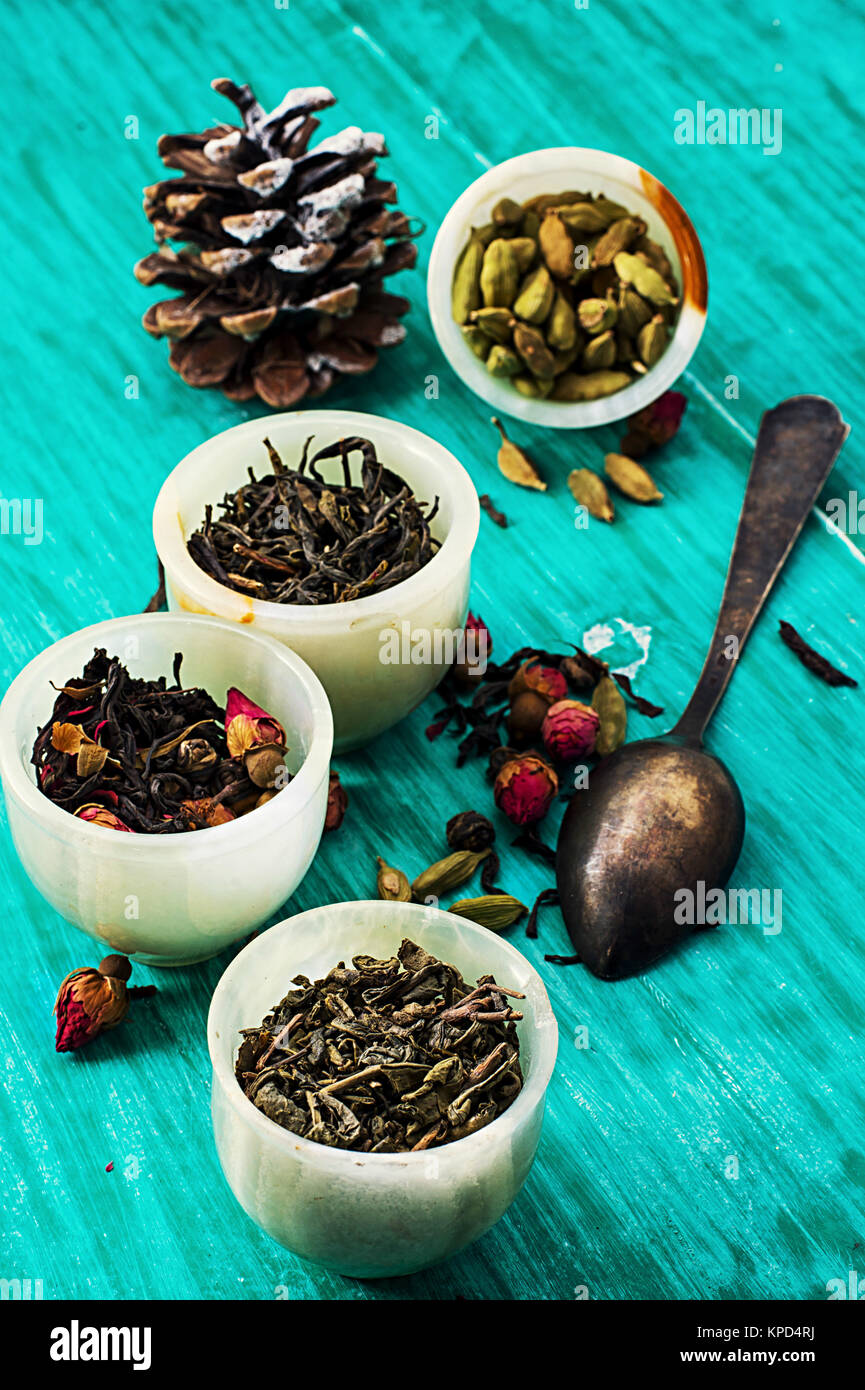 range of different varieties of tea leaves on wooden background Stock ...