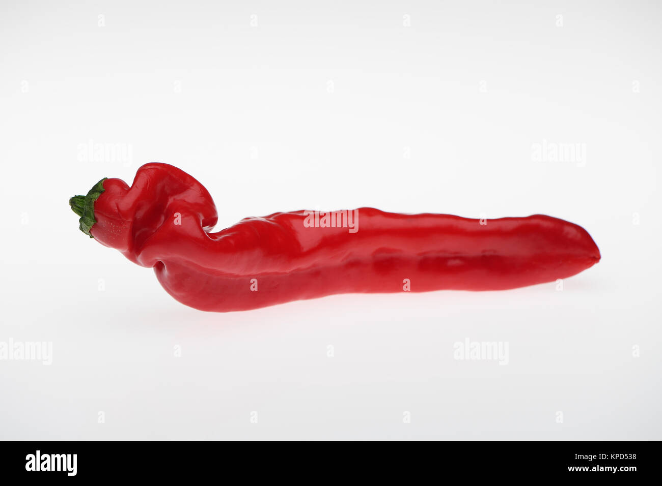 Whole Red sweet pointed pepper on a white background Stock Photo - Alamy