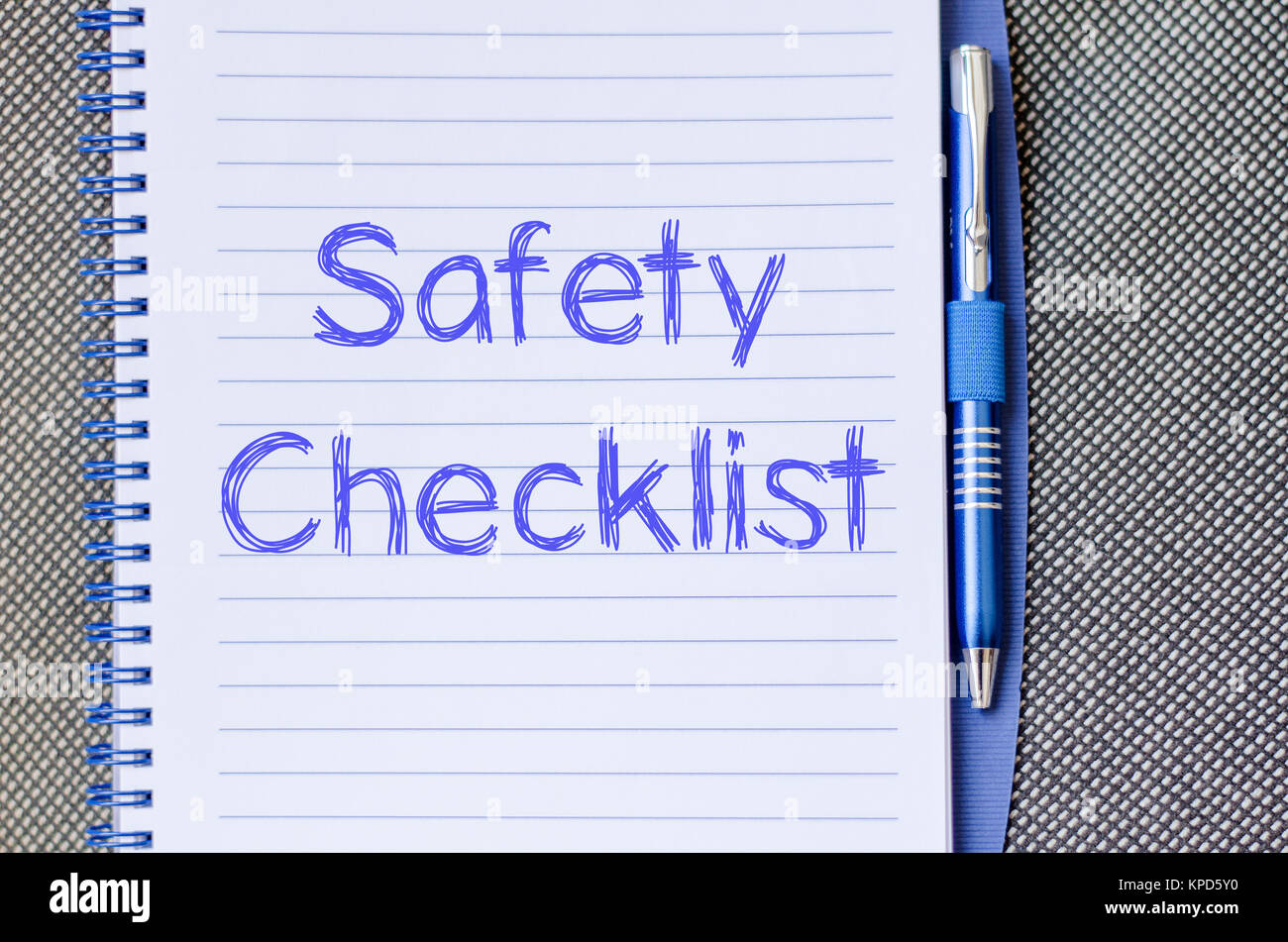 Safety checklist write on notebook Stock Photo - Alamy