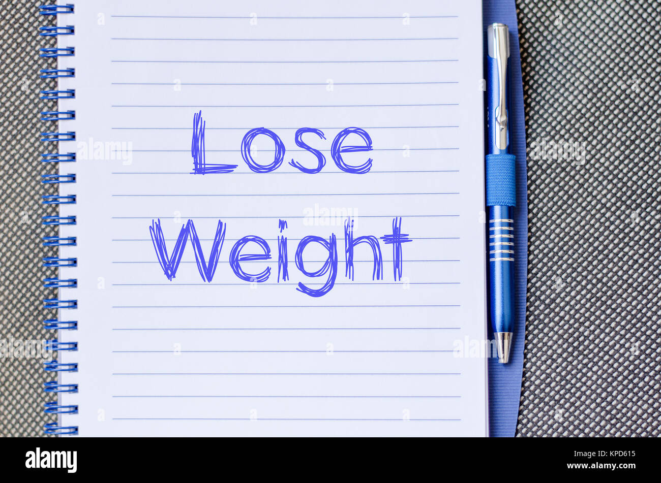 Lose weight write on notebook Stock Photo - Alamy