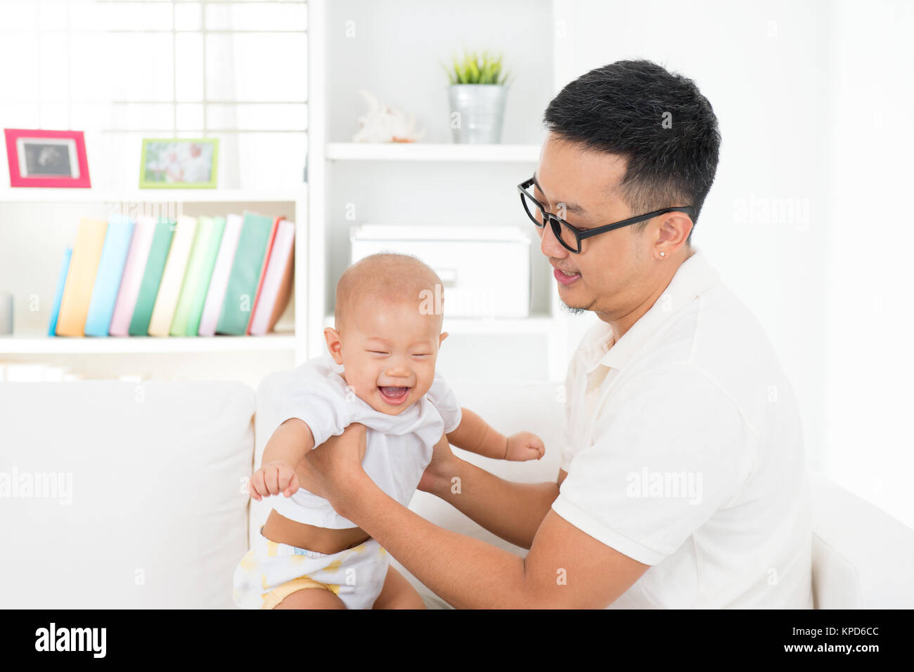 Father and baby boy playing Stock Photo - Alamy