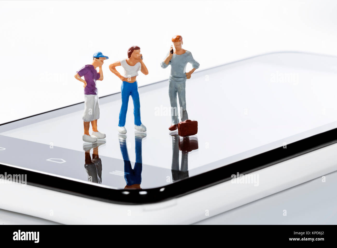 telefonierende figures on a smartphone Stock Photo - Alamy