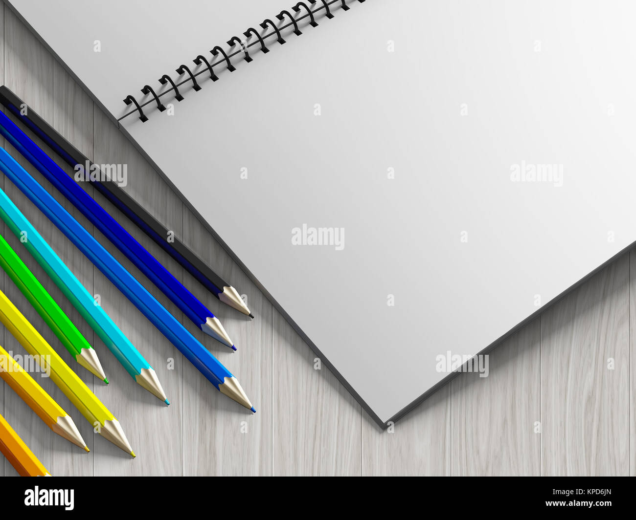 color pencil on checked notebook on wood background Stock Photo - Alamy