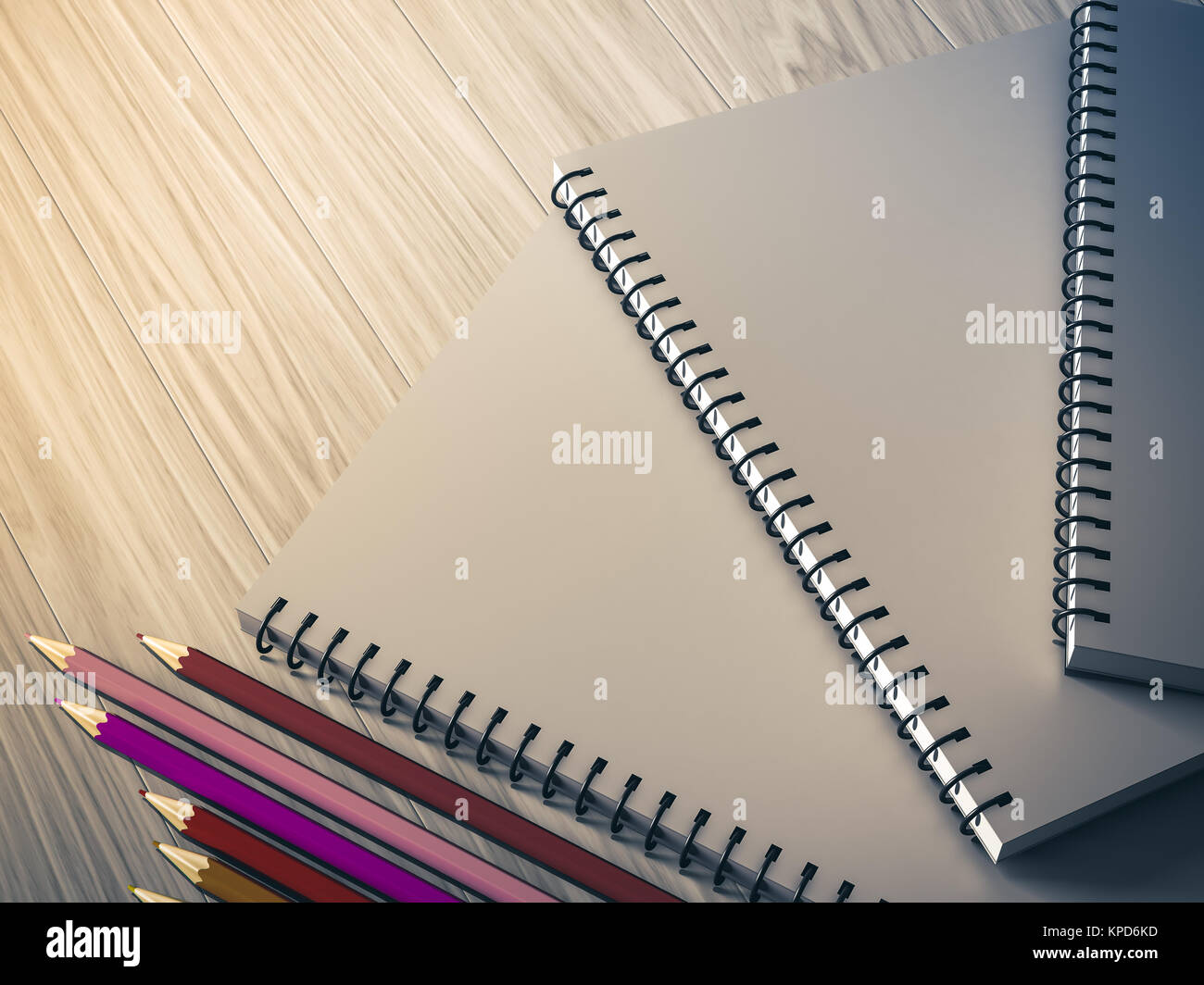 color pencil on checked notebook on wood background Stock Photo - Alamy