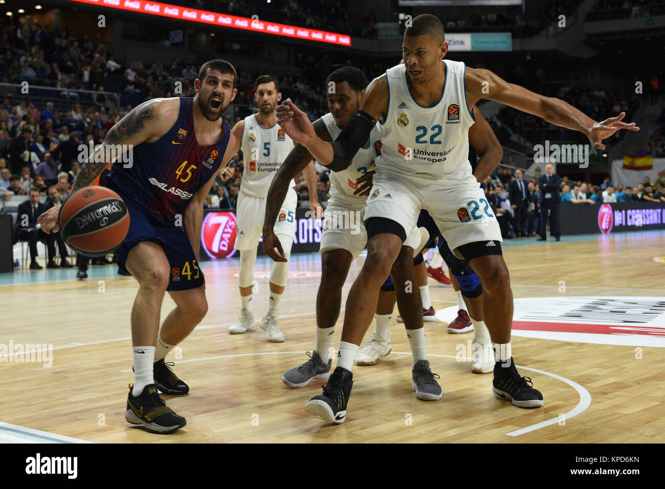 Madrid, Spain. 14th Dec, 2017. Adrien Moerman (left), #45 of FC ...