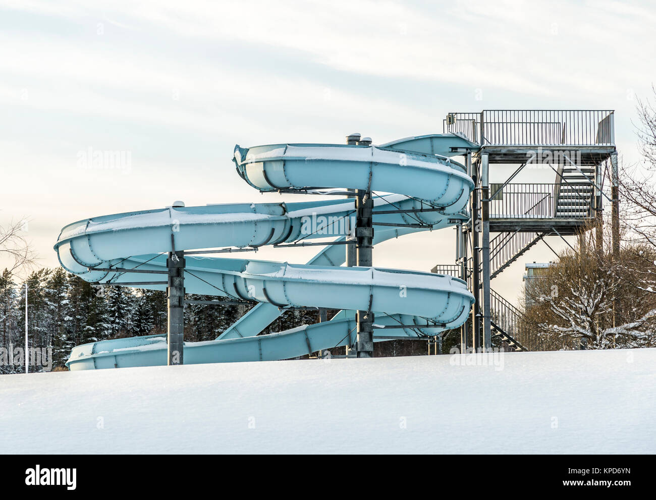 Water Slide in Winter with Snow Stock Photo - Alamy