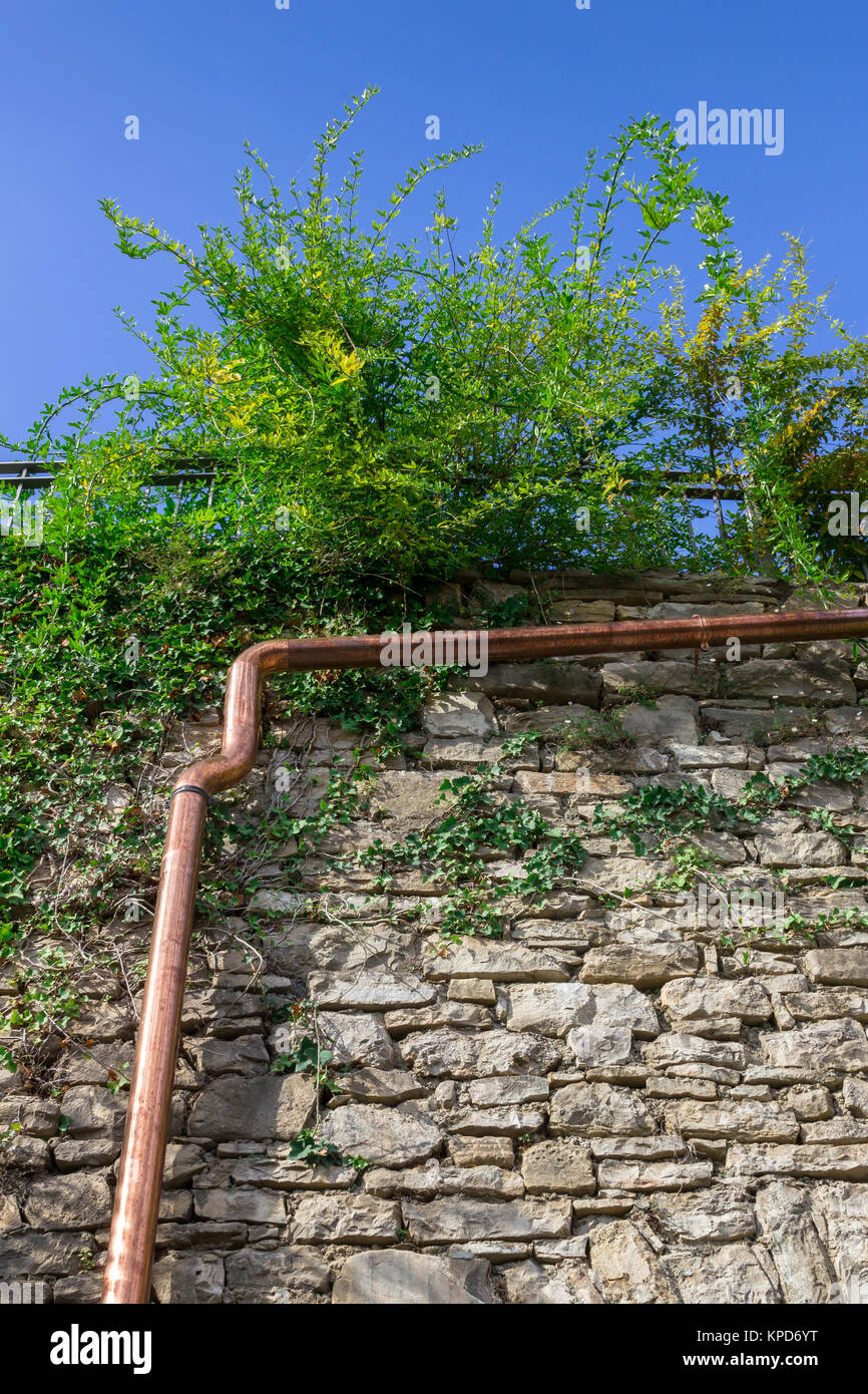 Gutter on wall Stock Photo - Alamy