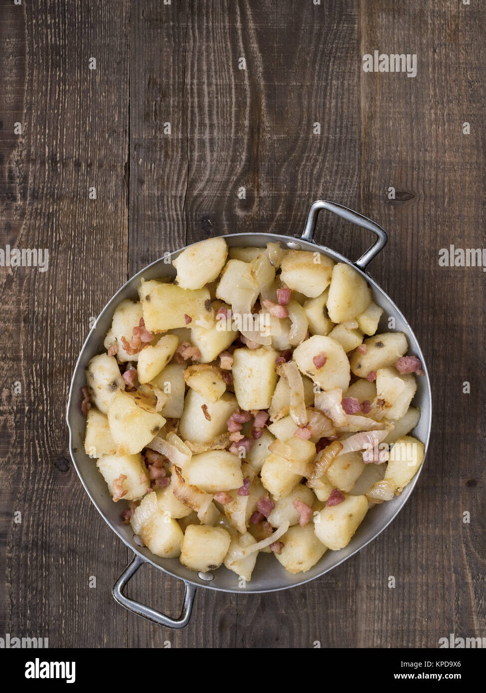 rustic german pan fried potato bratkartoffeln Stock Photo - Alamy