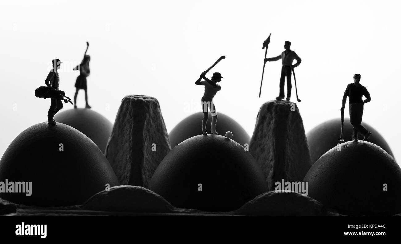 Playing golf on eggs Stock Photo - Alamy