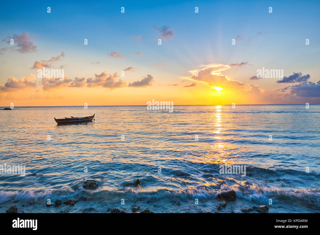 Sunrise over ocean Stock Photo - Alamy