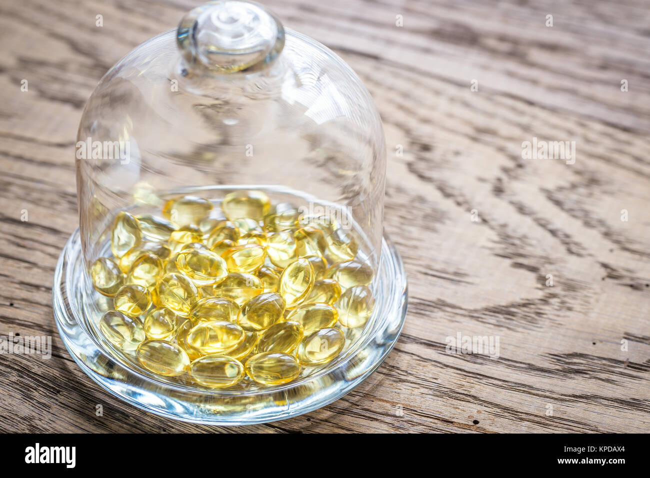 Omega-3 capsules under the glass dome Stock Photo - Alamy