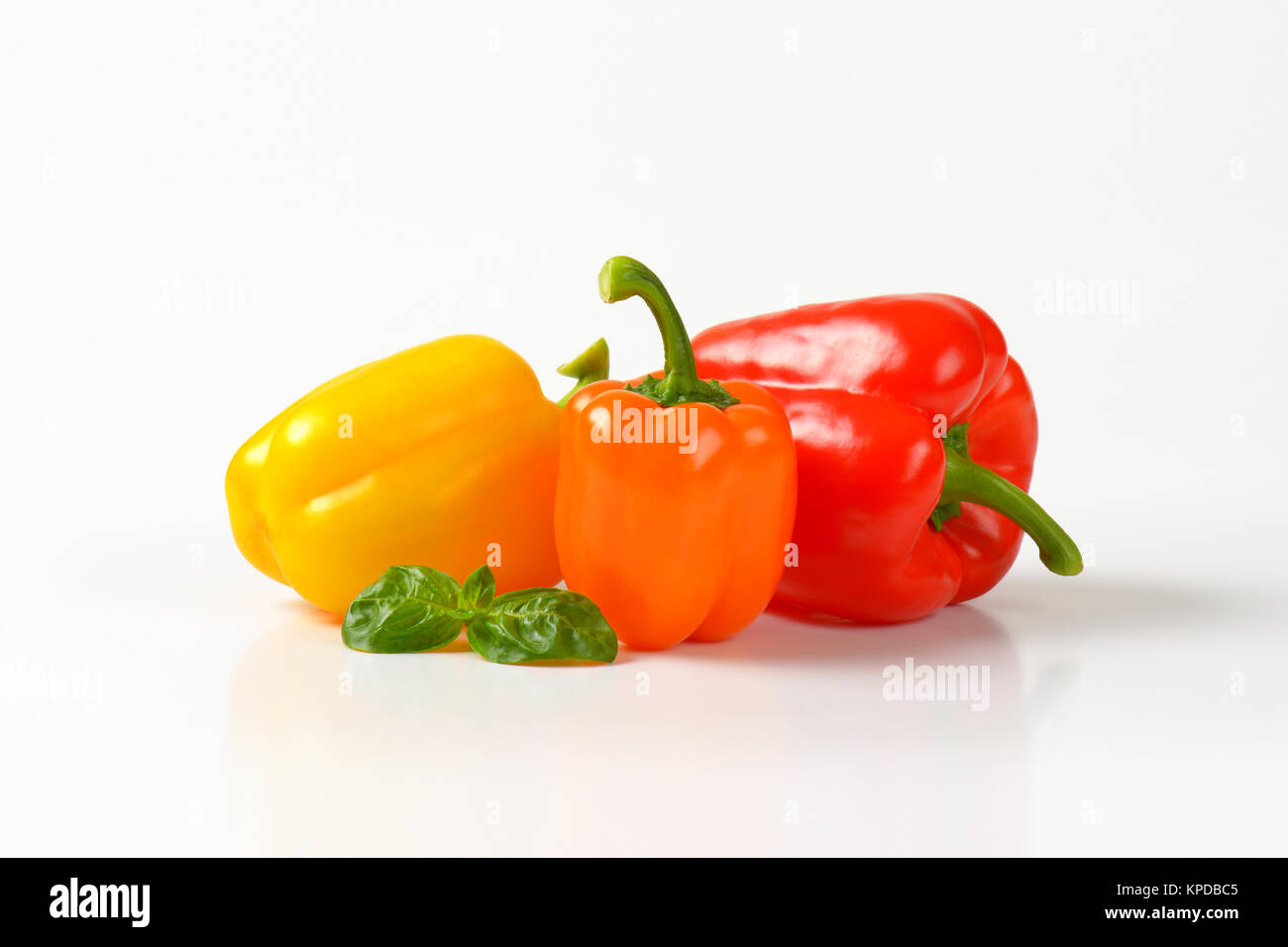 three ripe bell peppers Stock Photo - Alamy