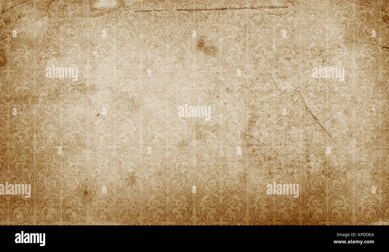 Aged stained paper background with decorative old-fashioned patterns ...