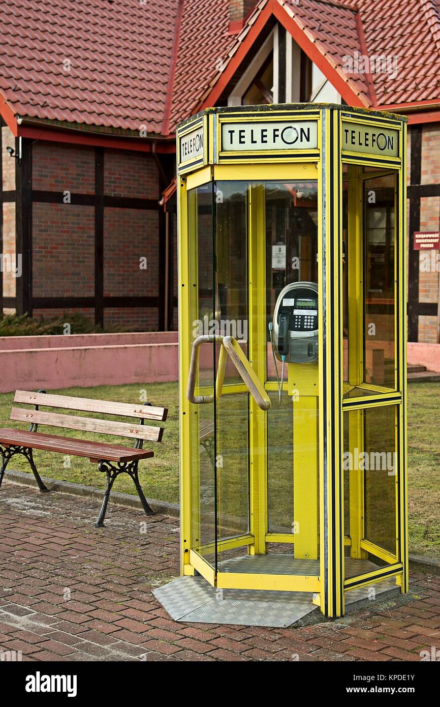 Yellow phone booth Stock Photo - Alamy