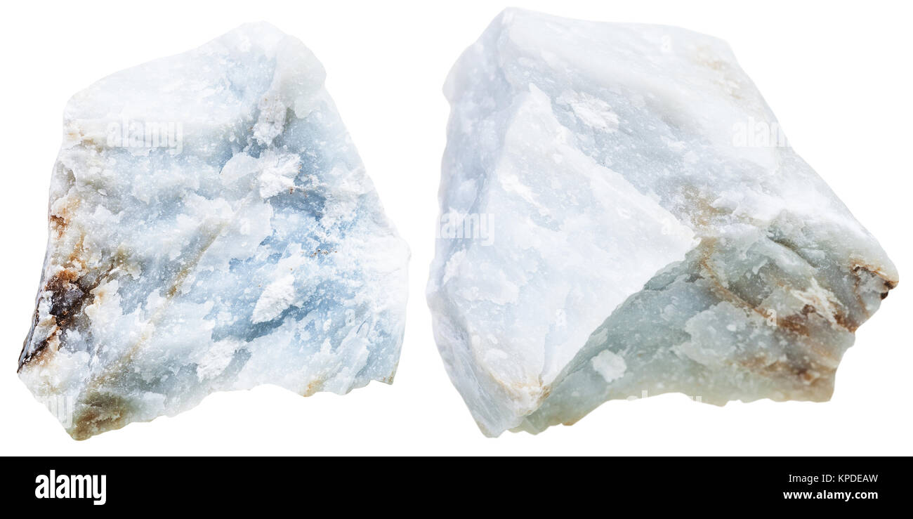 two pieces blue Anhydrite (Angelite) rock isolated Stock Photo - Alamy