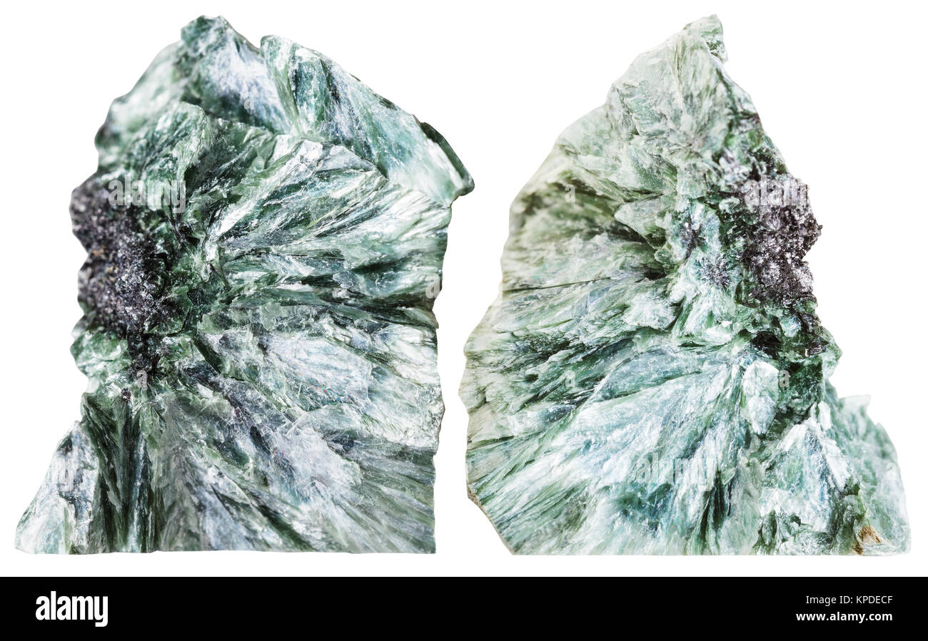 two pieces of clinochlore gemstone isolated Stock Photo - Alamy