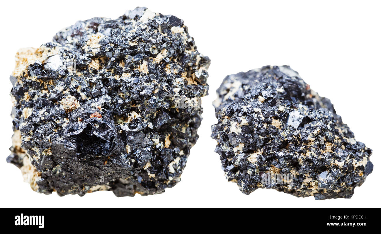 two pieces of Perovskite crystalline rock isolated Stock Photo - Alamy