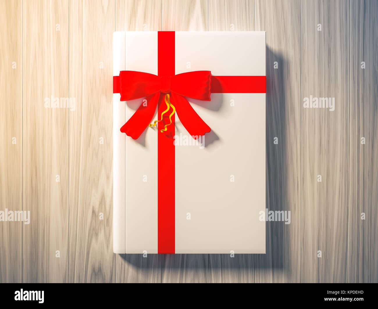 Book wrapped with color ribbon Stock Photo - Alamy