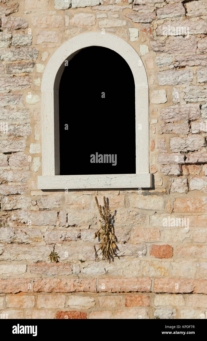 one windows in the bricks wall of an ancient building Stock Photo - Alamy
