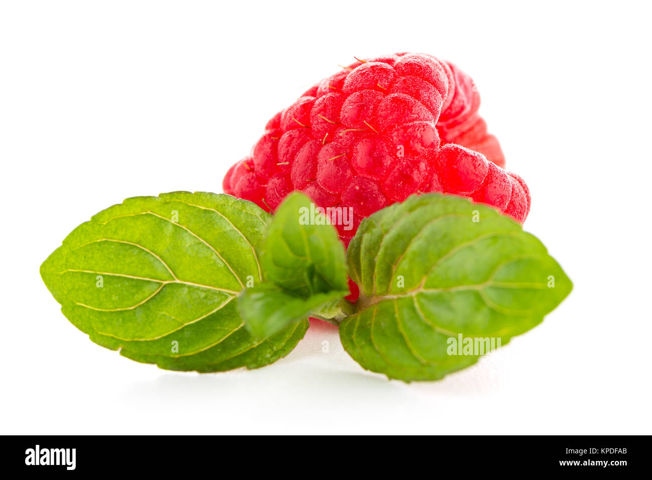 Raspberries with leaves Stock Photo - Alamy