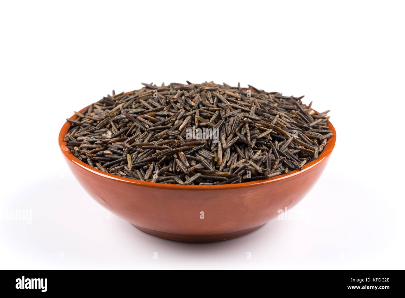 Wild brown rice in bowl Stock Photo - Alamy