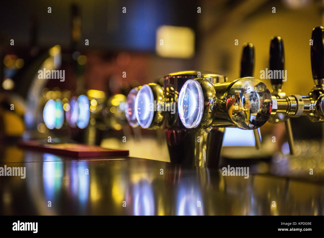 Metallic beer taps Stock Photo - Alamy
