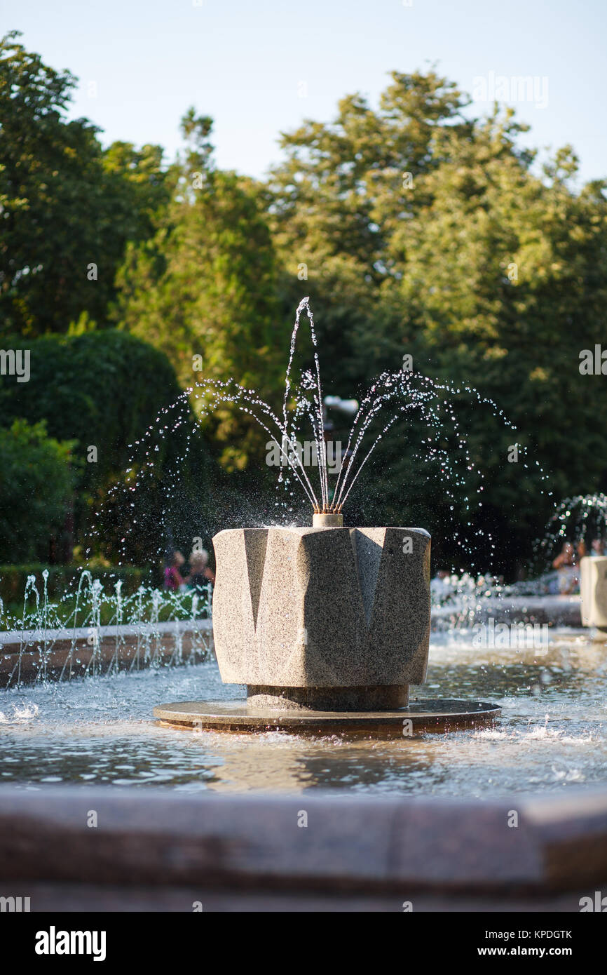 Water stream splashing on ground Stock Photo - Alamy