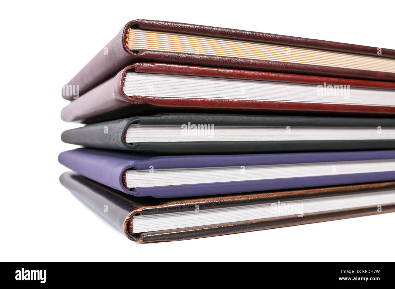 pile of books in leather covers Stock Photo - Alamy