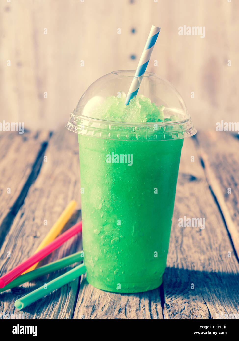 Close Up Still Life of Plastic Cup Filled with Refreshing Frozen Green ...