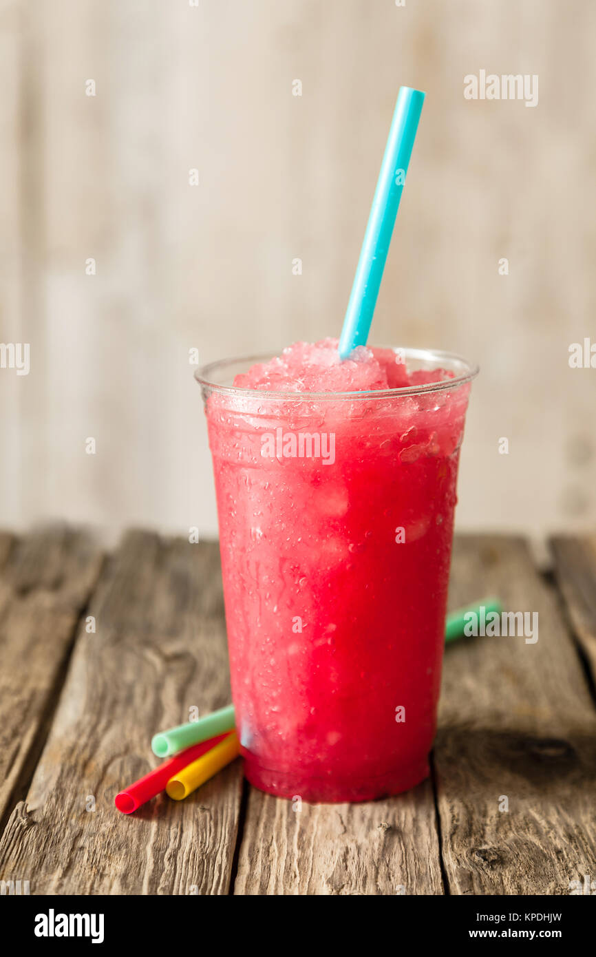Close Up Still Life Profile View of Refreshing Frozen Red Slush Drink ...