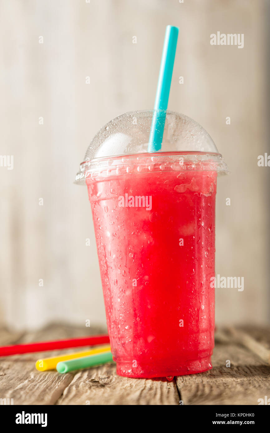 Close Up Still Life Profile View of Refreshing Frozen Red Slush Drink ...