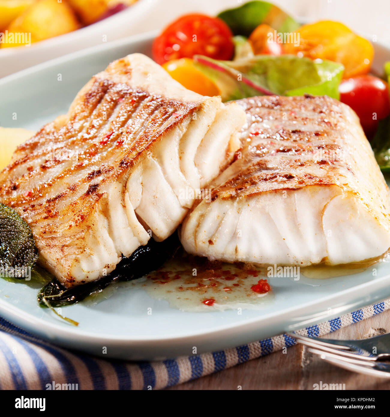 fillets of savory marinated pollock Stock Photo - Alamy