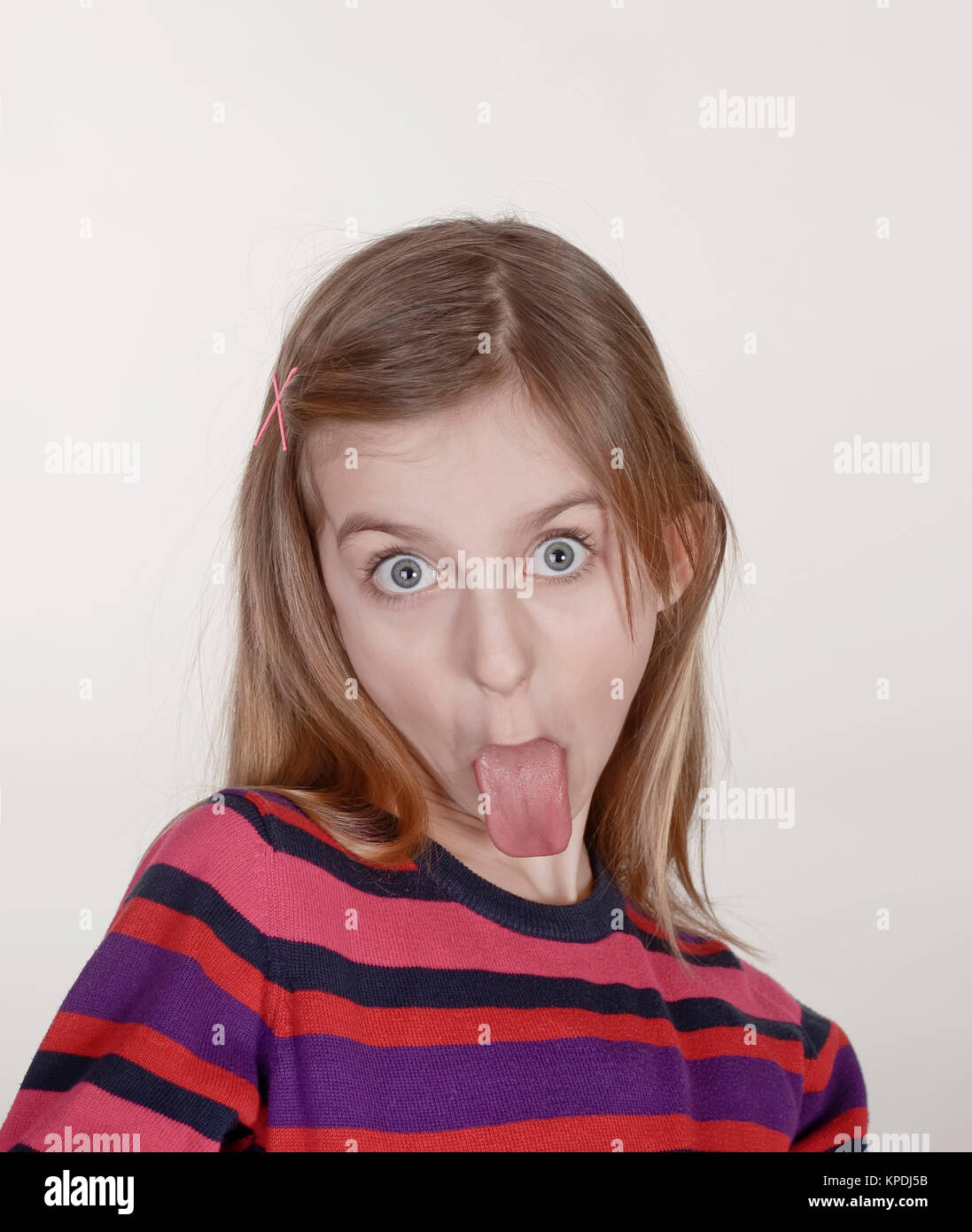 Show her tongue hi-res stock photography and images - Alamy