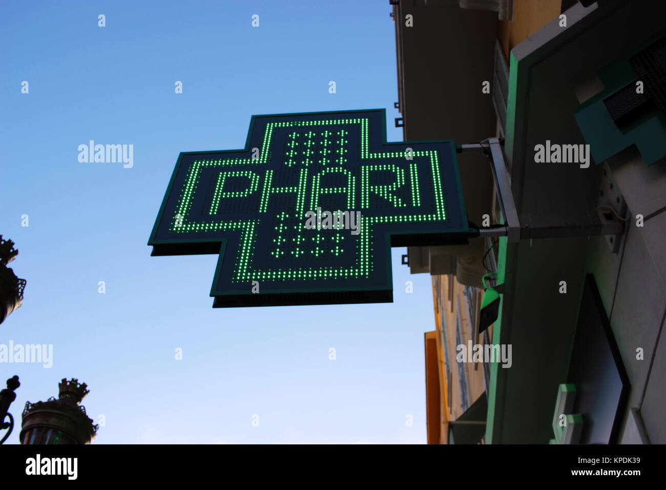 Neon Green Cross Sign Stock Photo - Alamy