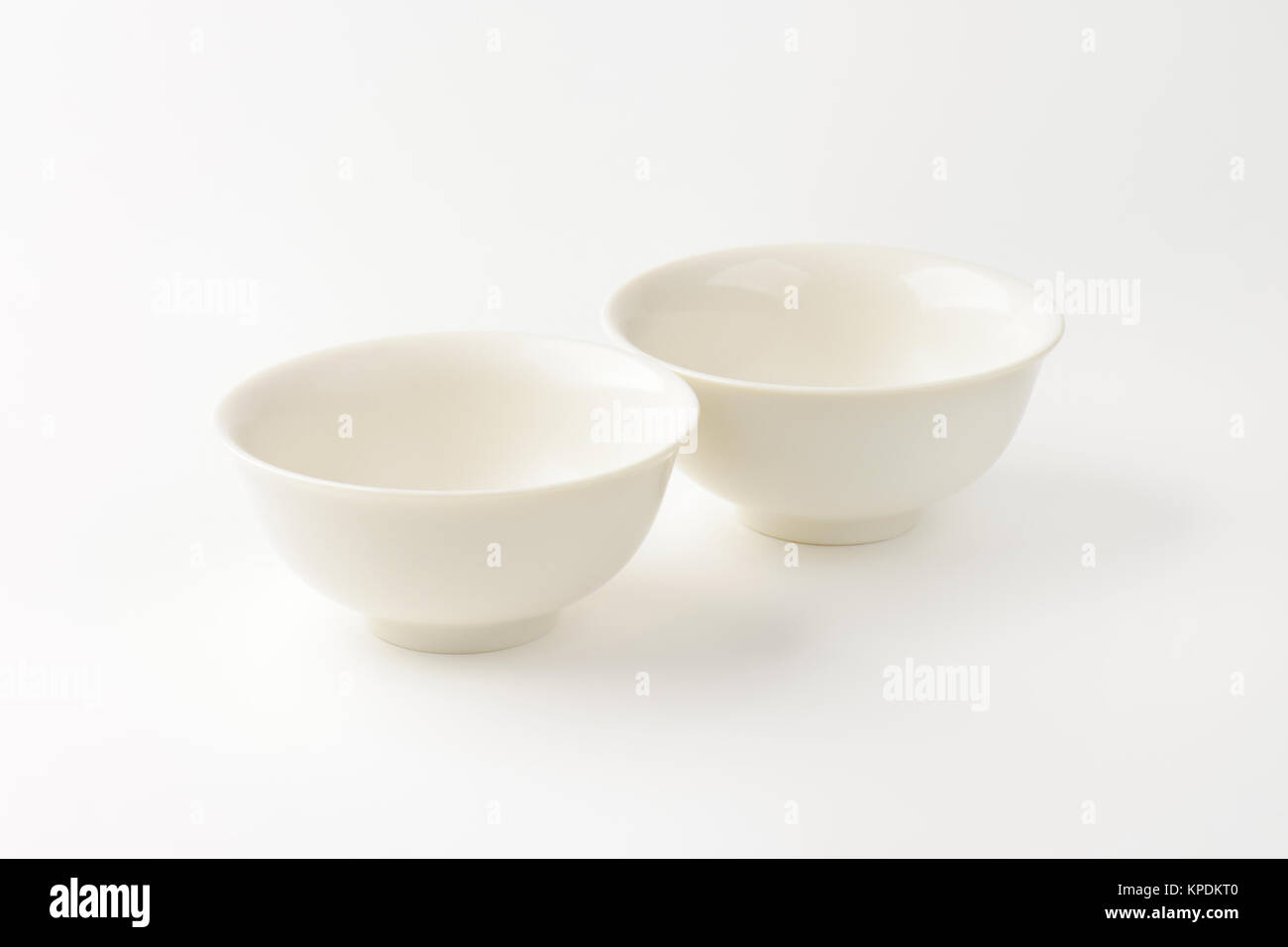 two white bowls Stock Photo - Alamy