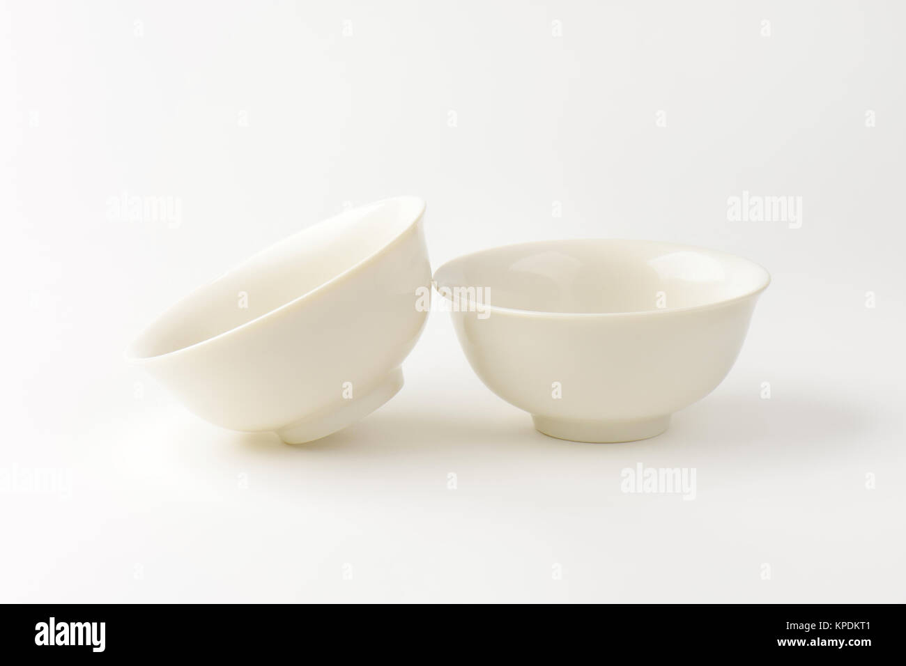 two white bowls Stock Photo - Alamy