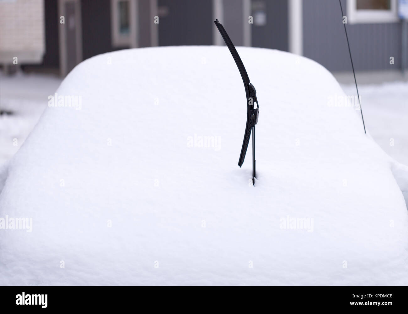 Windscreen Wiper on Snowy Car Stock Photo - Alamy