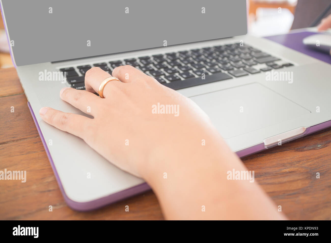 Hand typing on laptop keyboard Stock Photo - Alamy
