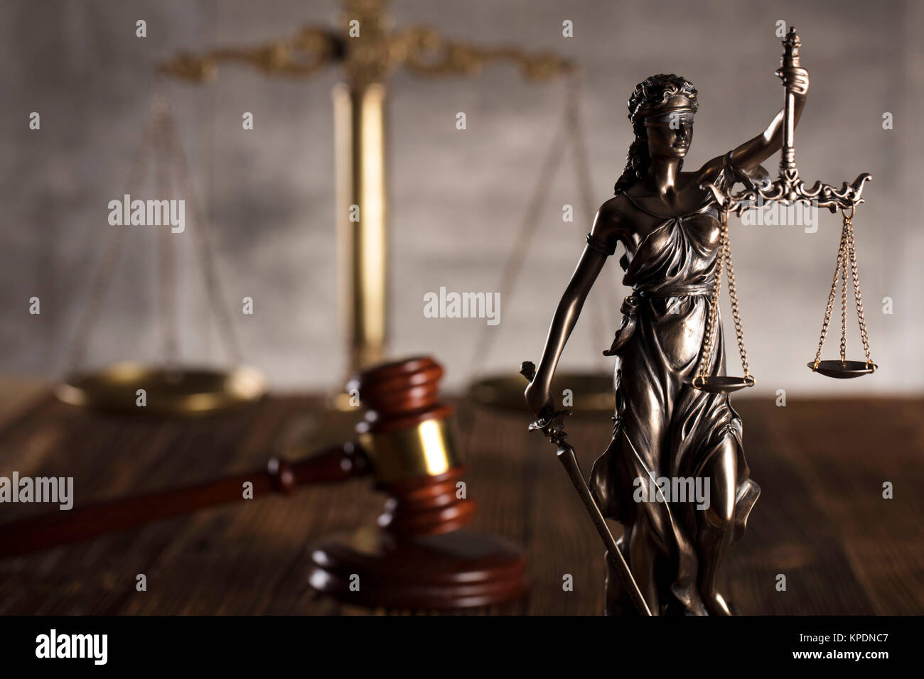 Statue of justice and gavel of the judge on a stone background and ... Statue of justice and gavel of the judge on a stone background and ...