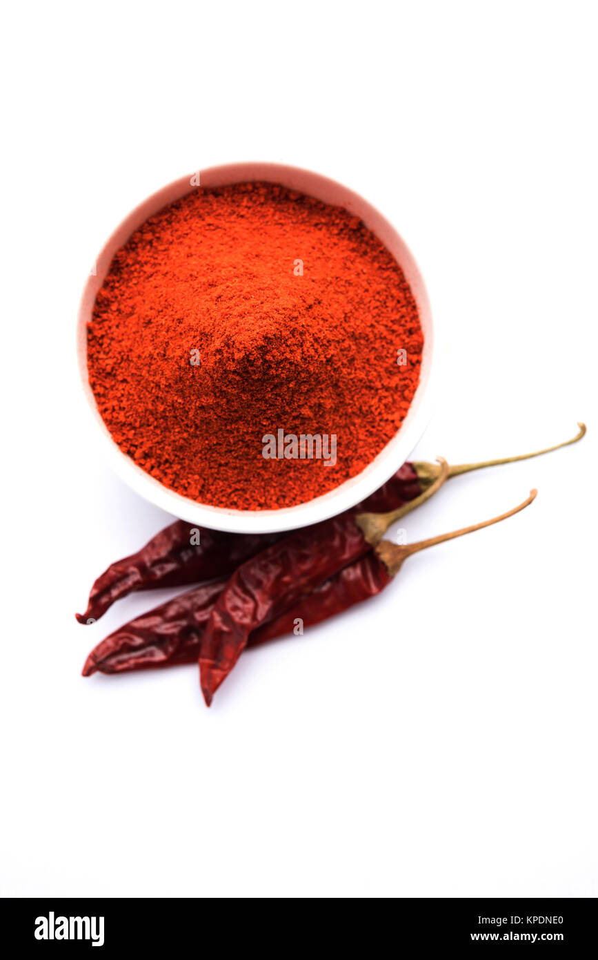 Red Chilly Powder in a bowl with dried red chillies over colourful ...